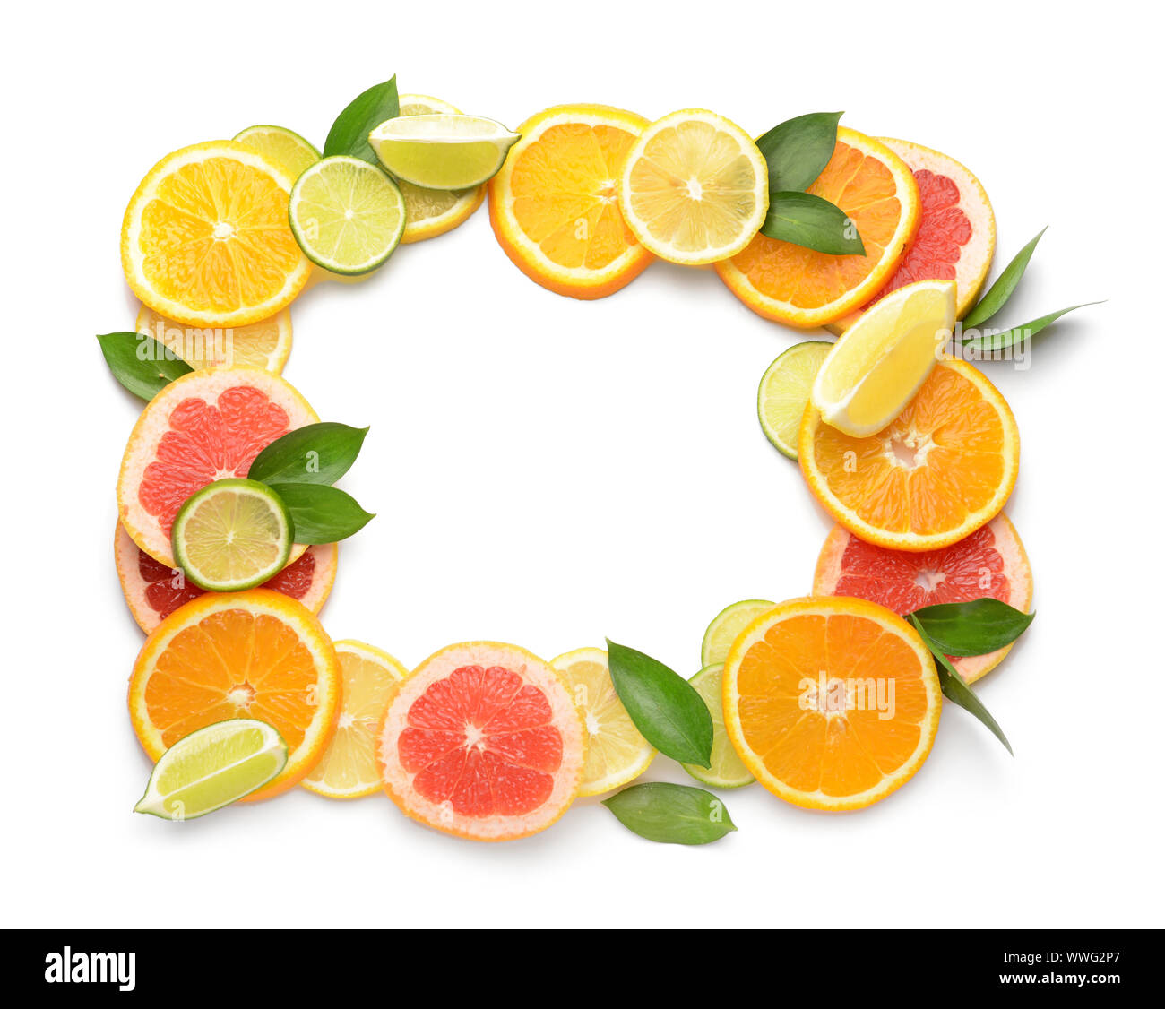 Frame made of different citrus fruits on white background Stock Photo ...