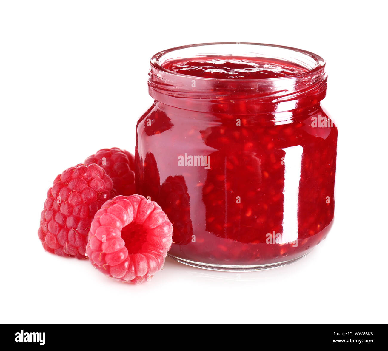 Jar of tasty raspberry jam on white background Stock Photo - Alamy