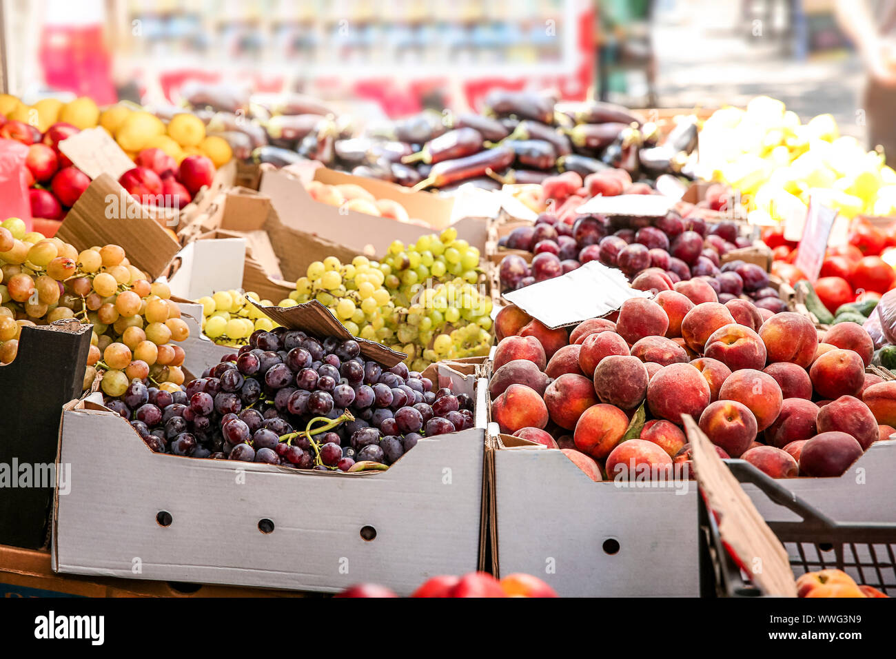Assortment of fresh fruits on counter at market Stock Photo - Alamy