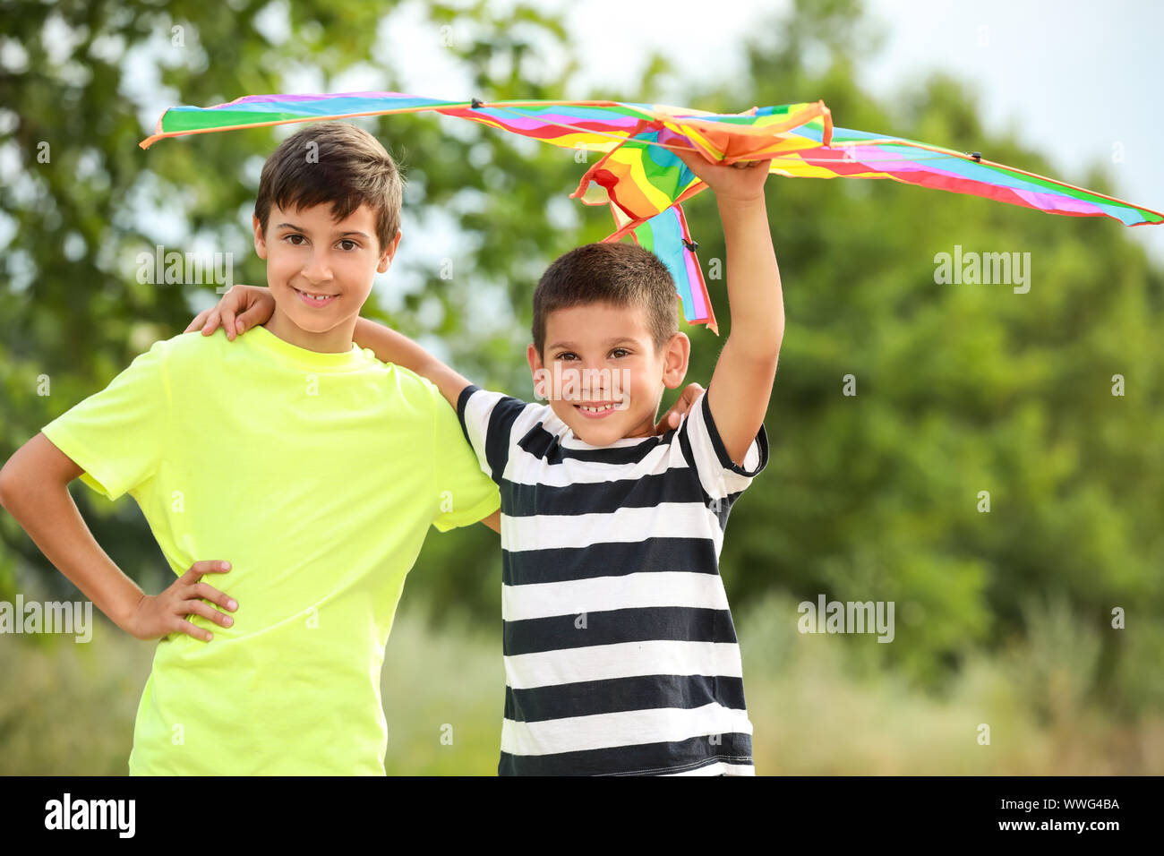 Little boys flying kite outdoors Stock Photo - Alamy