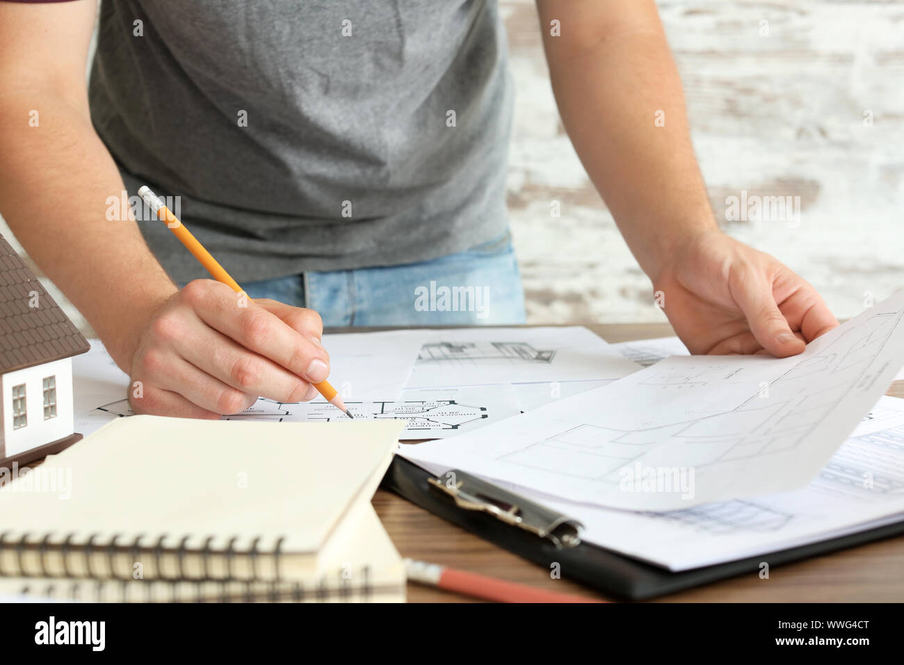 Architect working on project of building in office, closeup Stock Photo ...