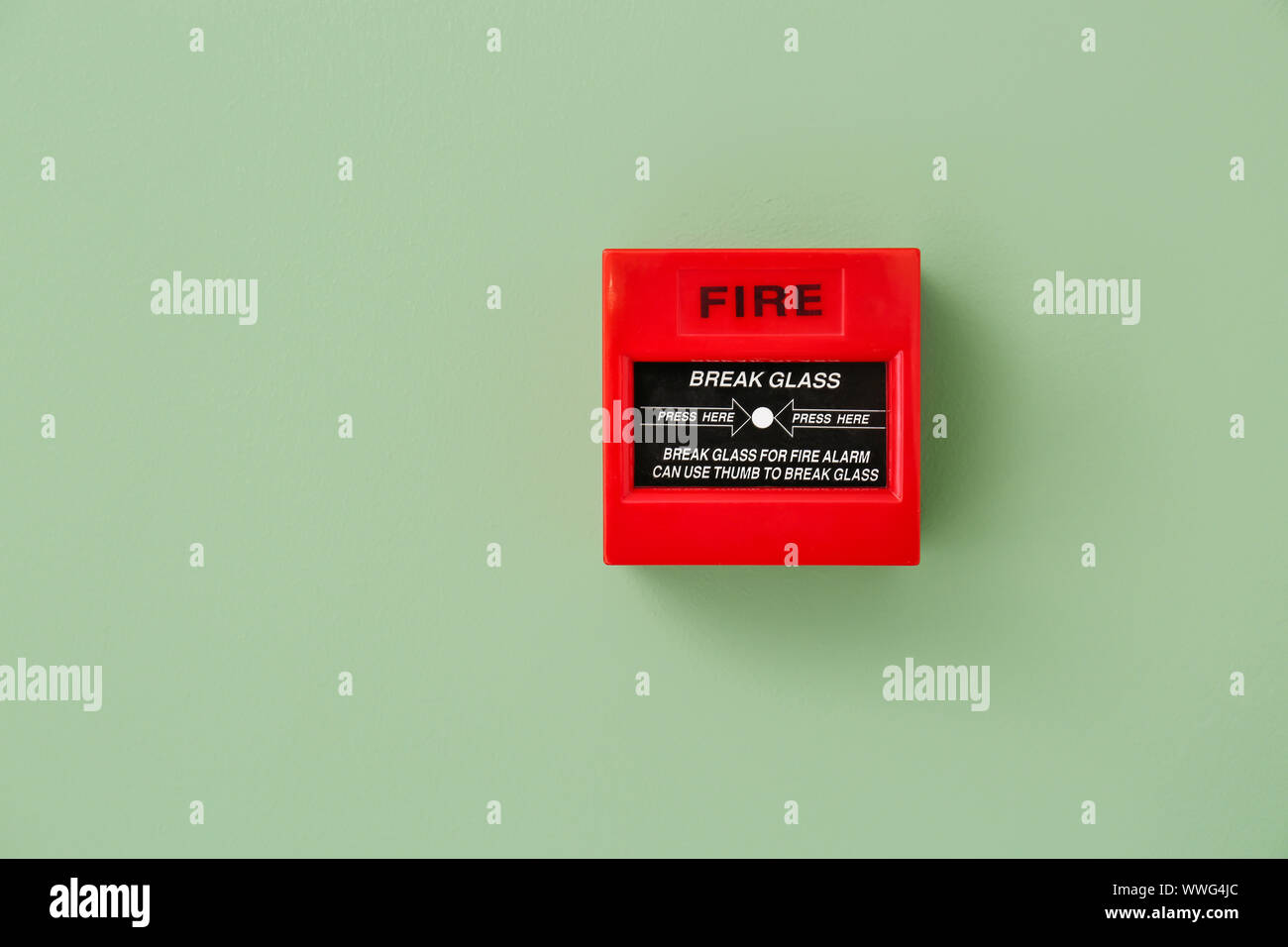 Modern manual call point of fire alarm system on color wall Stock Photo ...