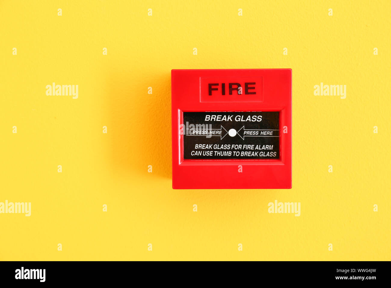 Modern manual call point of fire alarm system on color wall Stock Photo ...