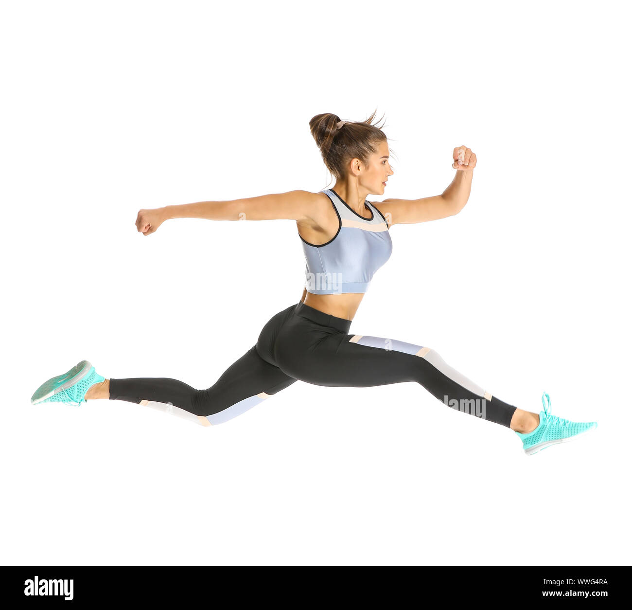 Running sporty woman on white background Stock Photo - Alamy