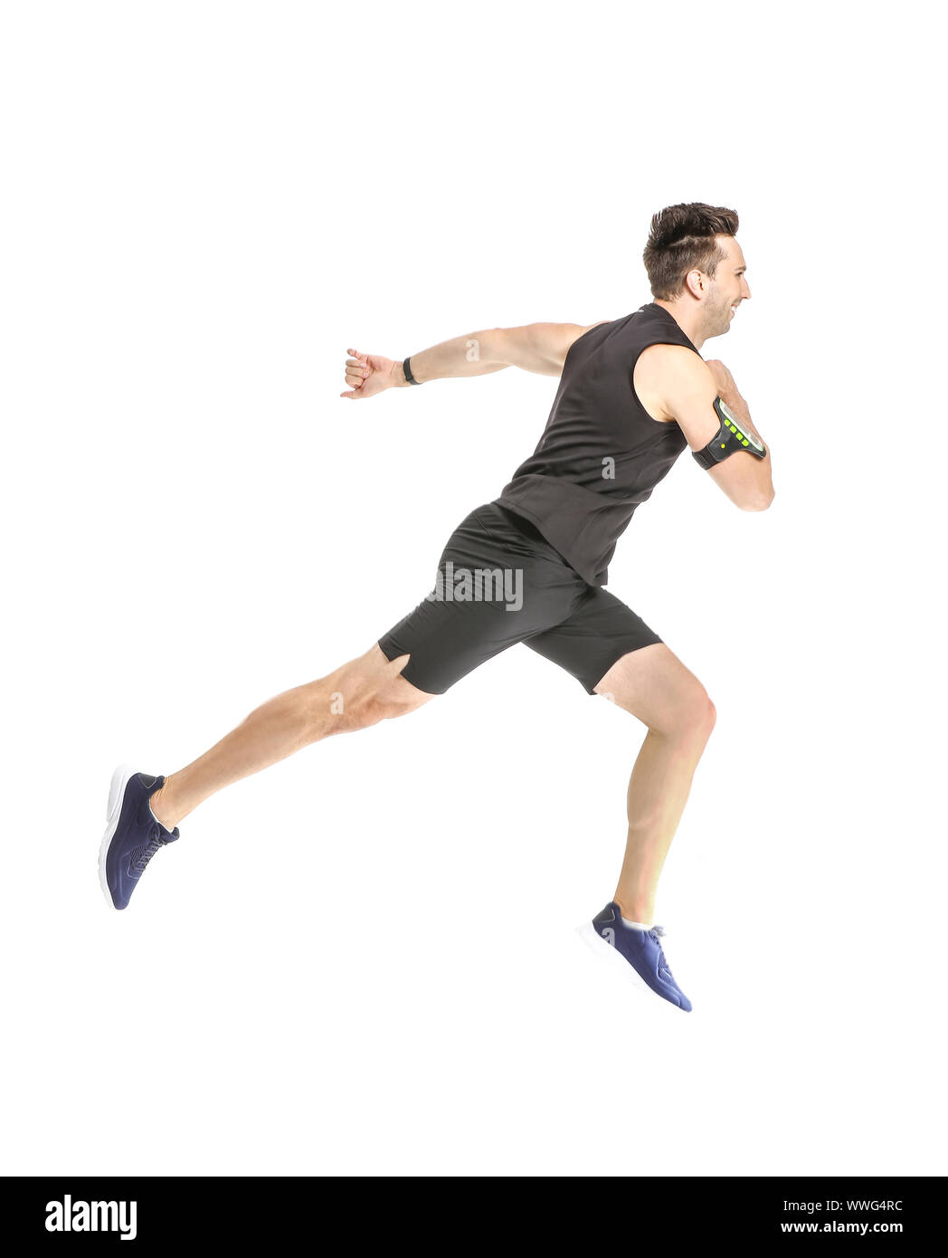 Running sporty man on white background Stock Photo - Alamy