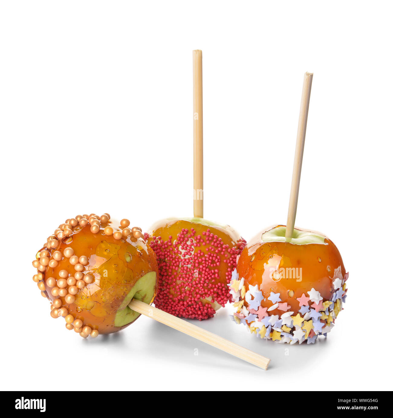Tasty candy apples on white background Stock Photo - Alamy