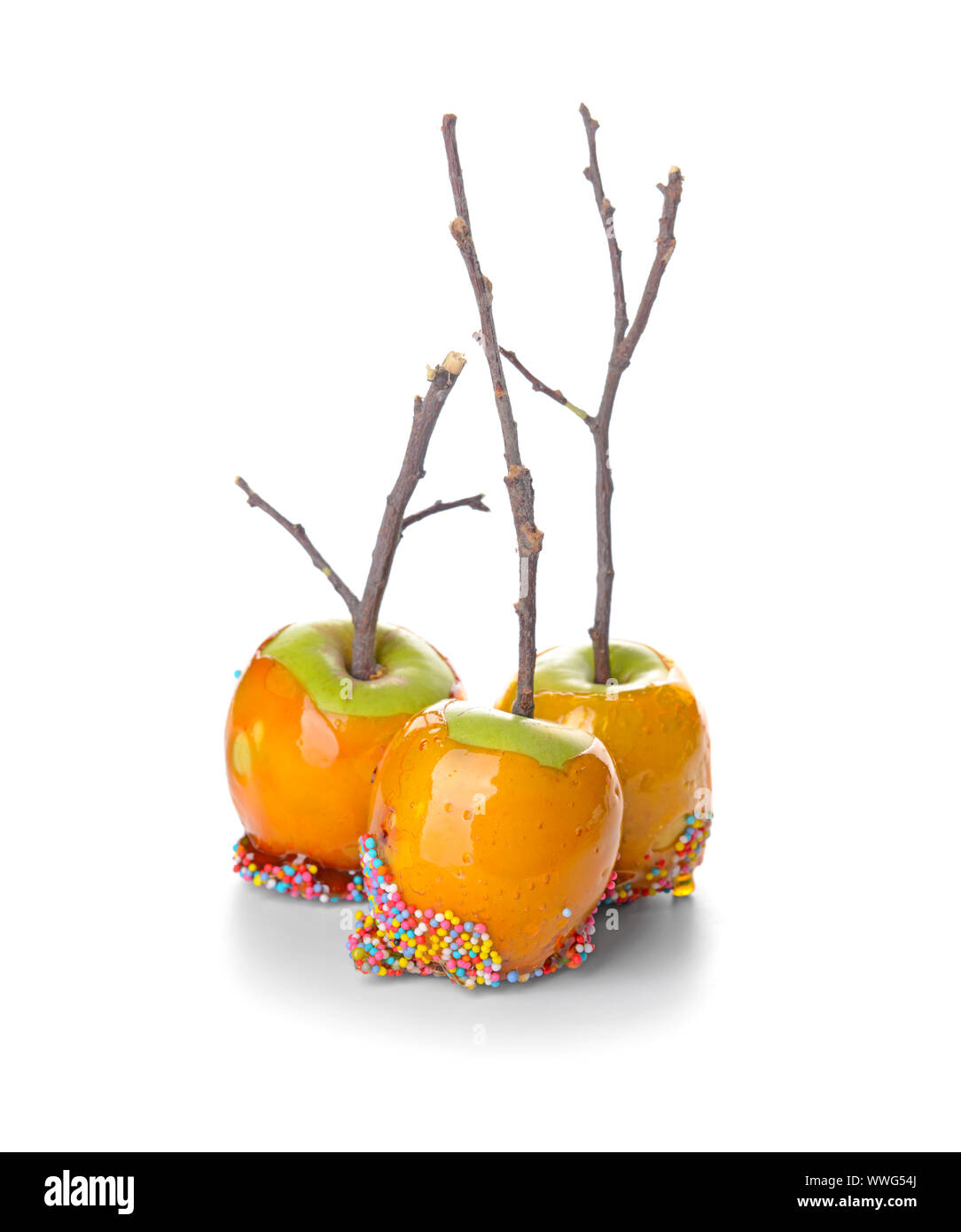 Tasty candy apples on white background Stock Photo - Alamy