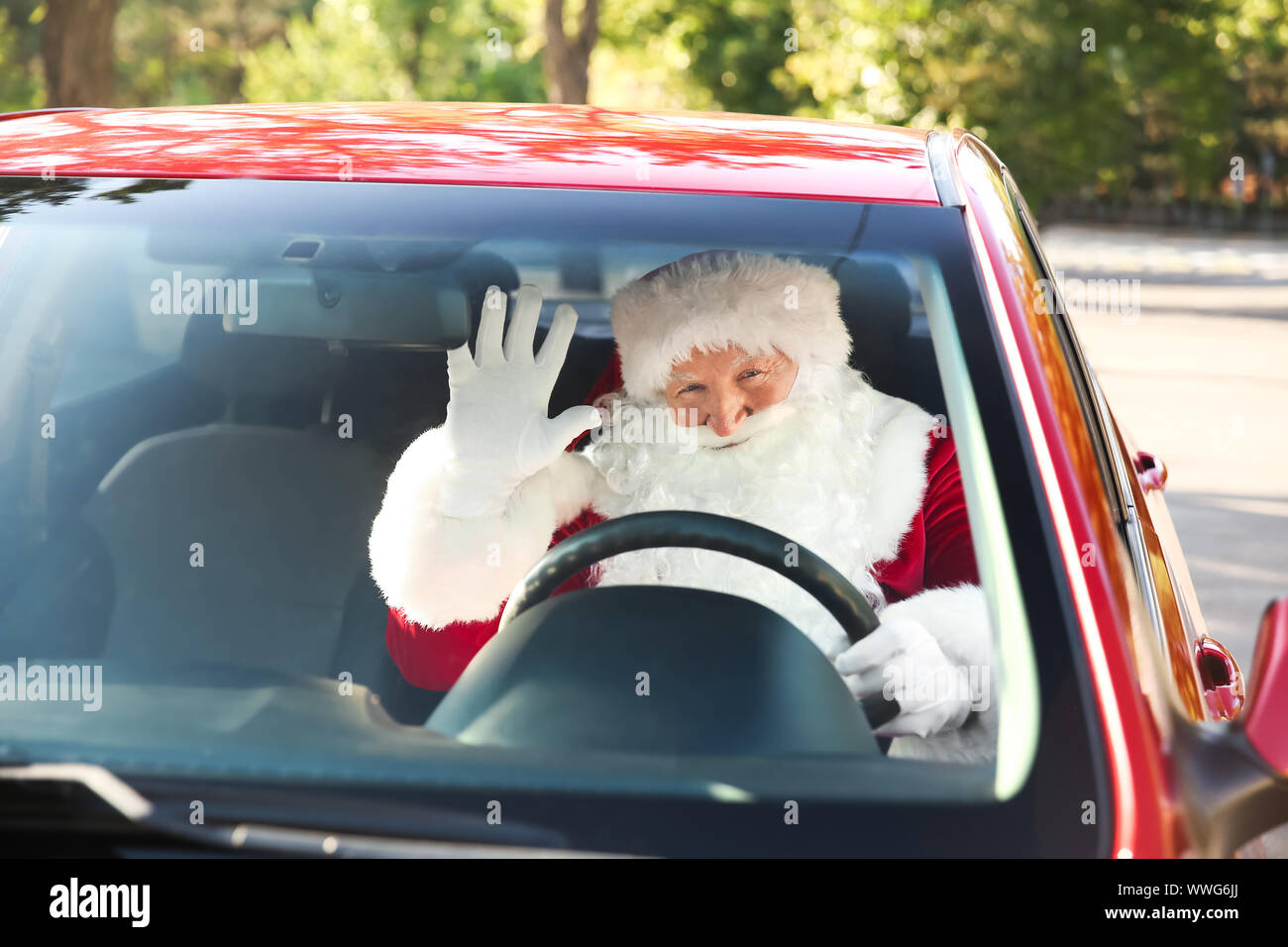 Santa Claus driving modern car, view through windscreen window Stock ...