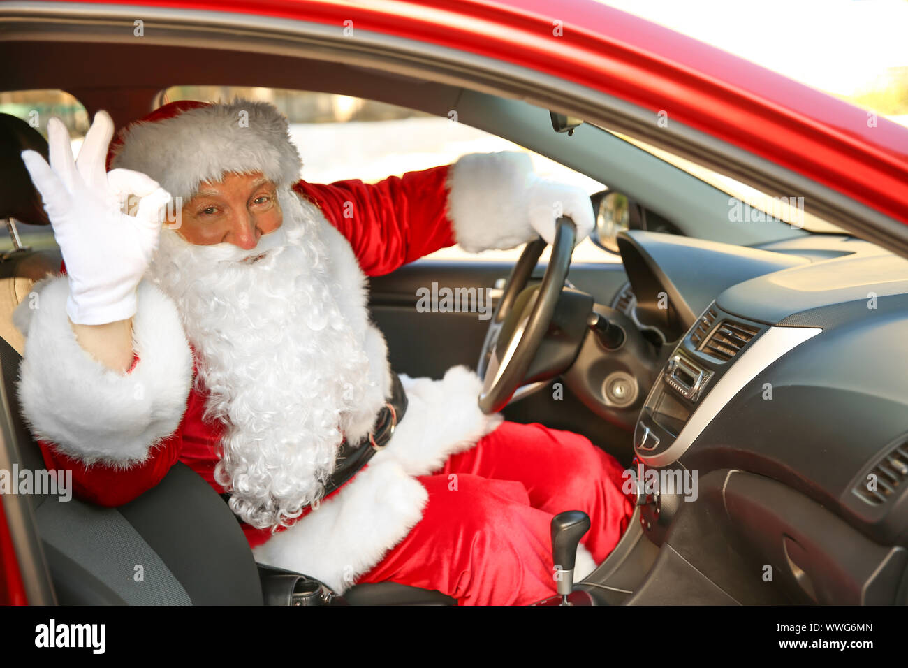 Santa claus driving car hi-res stock photography and images - Alamy