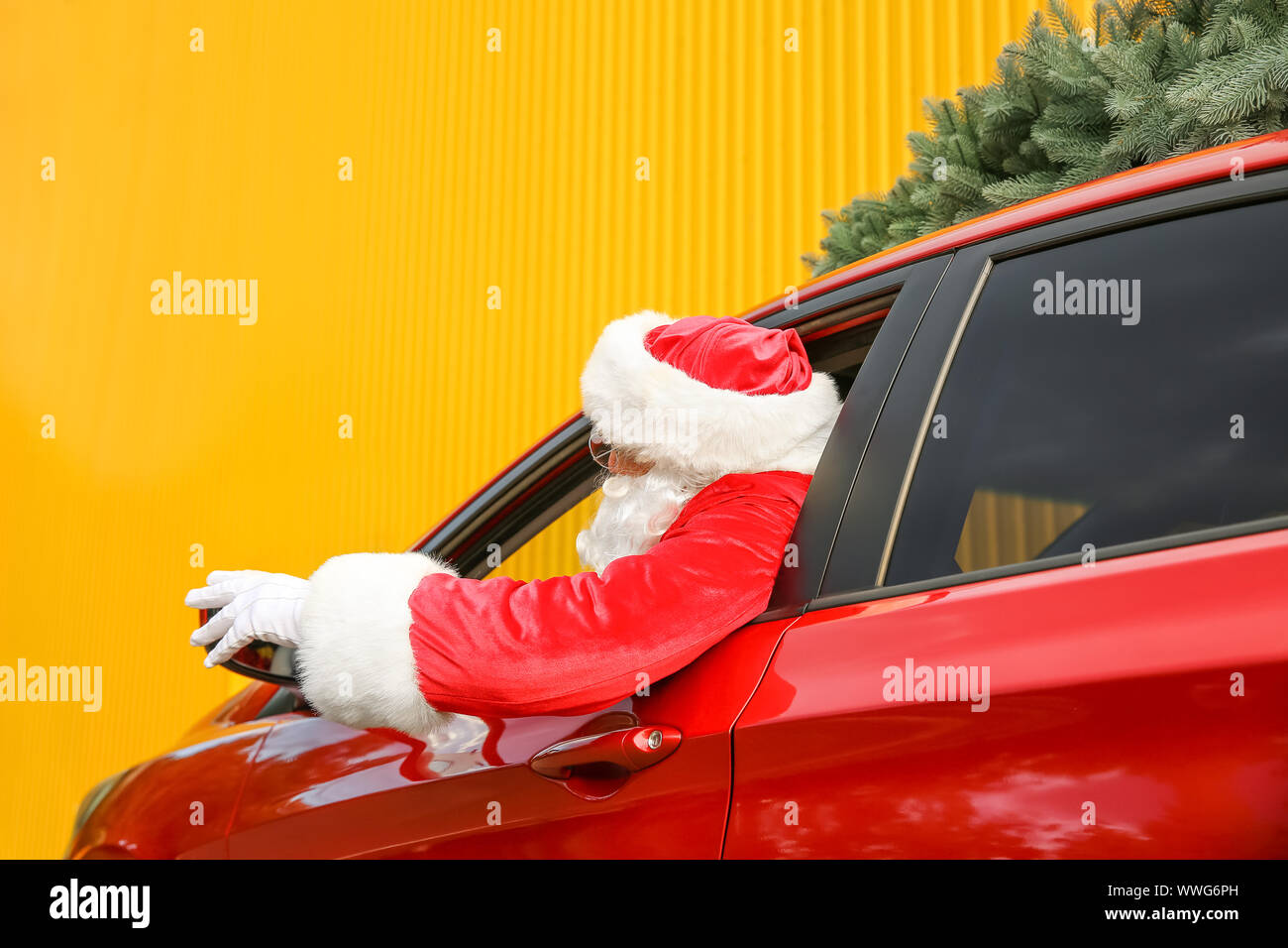 Santa claus looking out window hi-res stock photography and images - Alamy