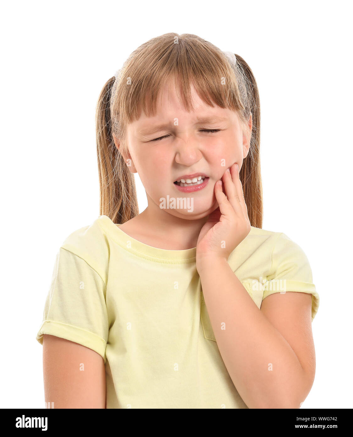 Little girl suffering from toothache on white background Stock Photo ...