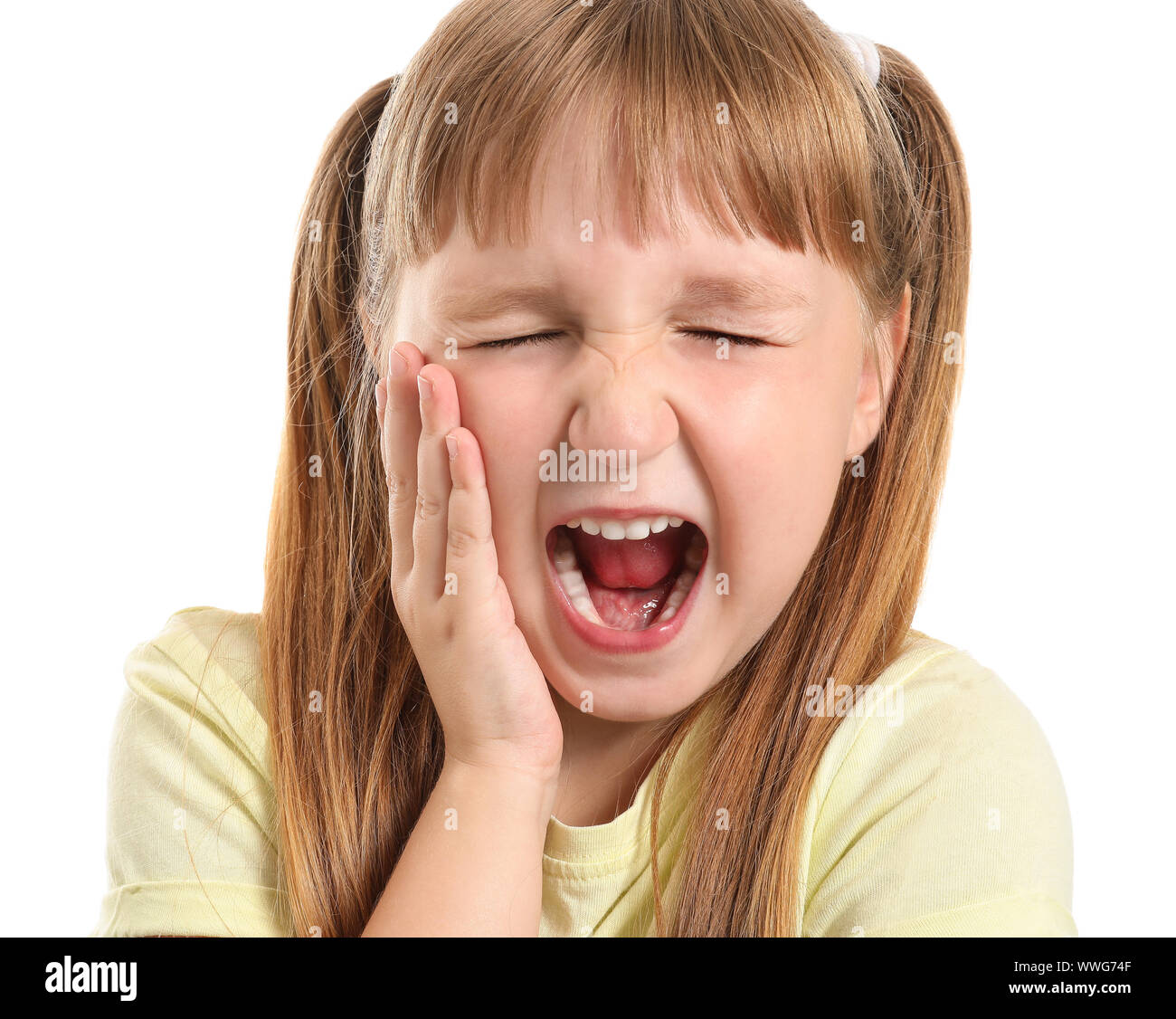 Little girl suffering from toothache on white background Stock Photo ...