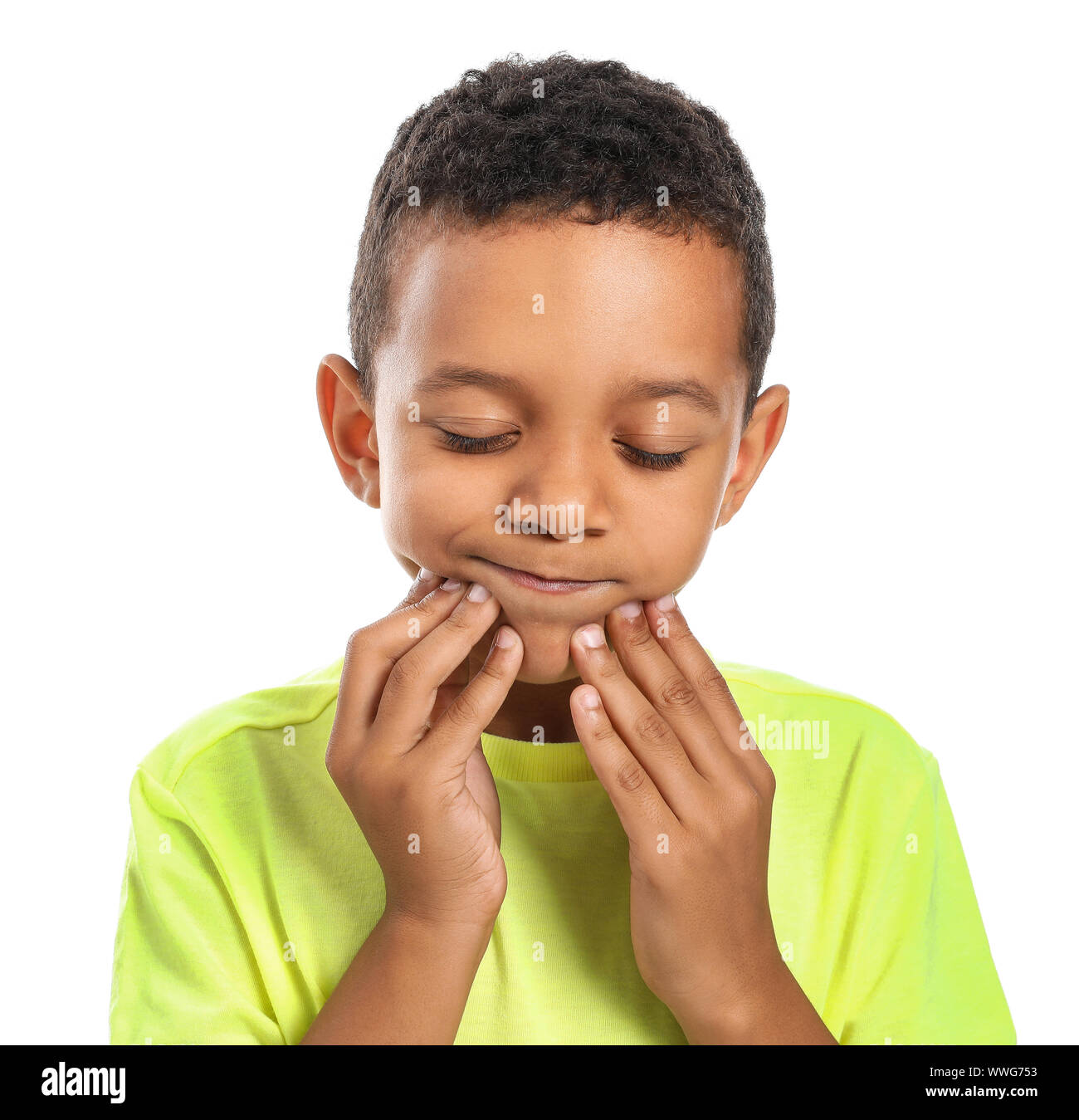 Little African-American boy suffering from toothache against white ...