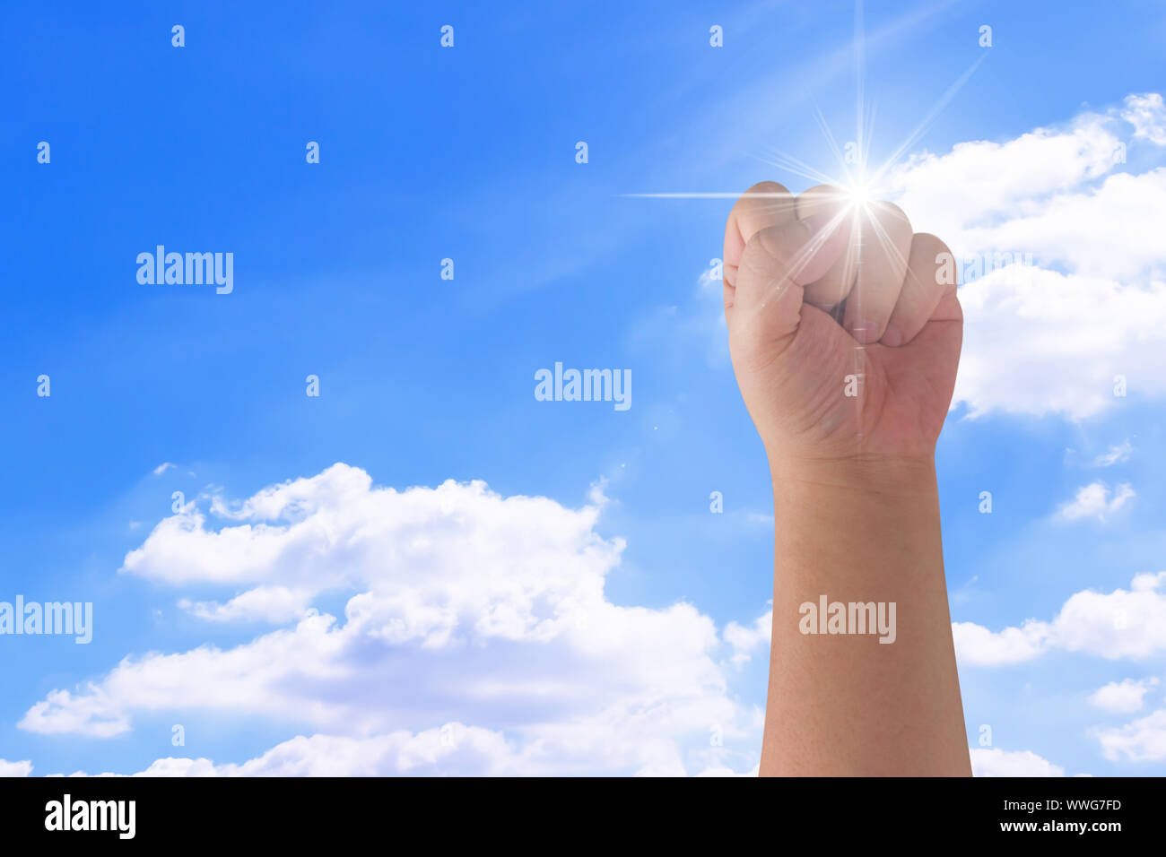 Motivation and inspiration concept, hand on blue sky background Stock ...