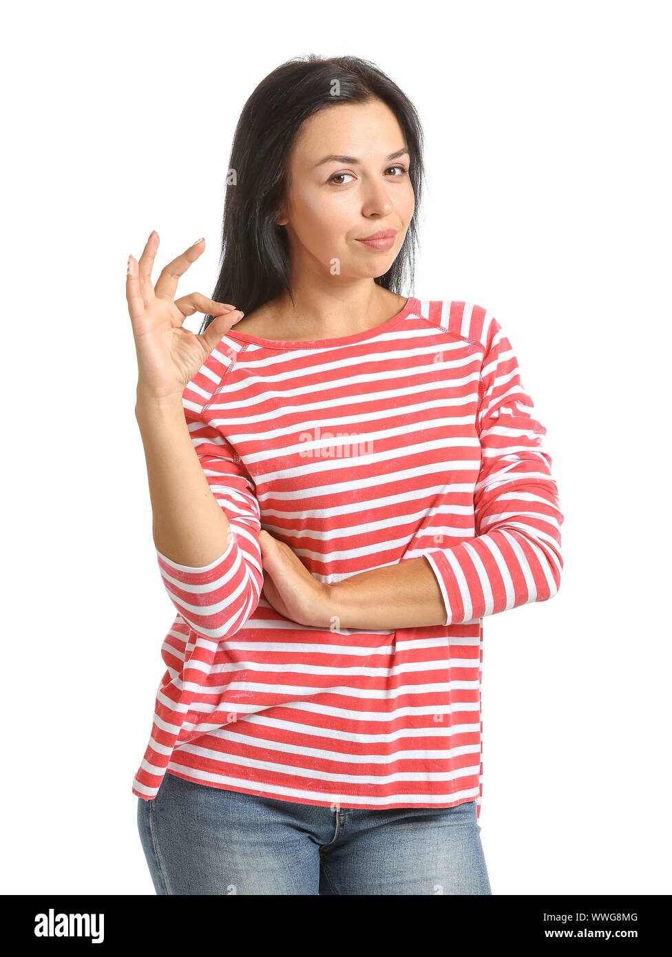 Portrait Of Beautiful Woman Showing Ok Gesture On White Background