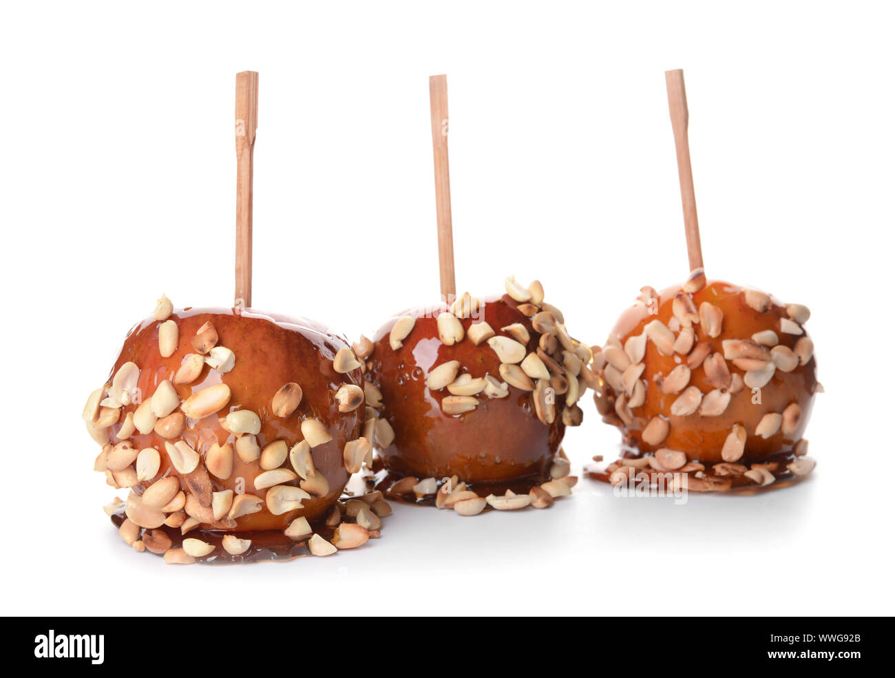 Tasty candy apples on white background Stock Photo - Alamy