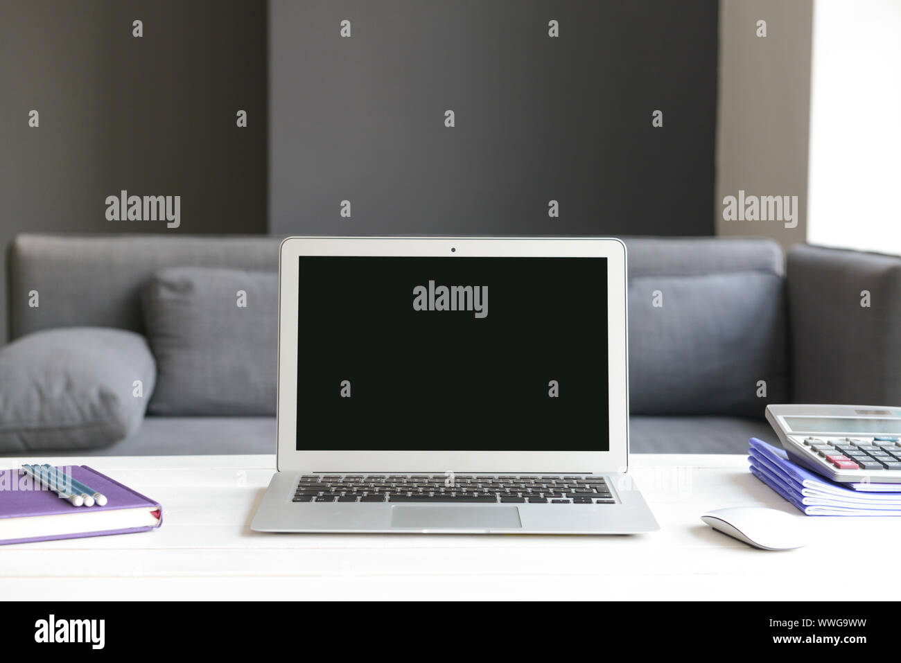 Stylish workplace with modern laptop in office Stock Photo - Alamy