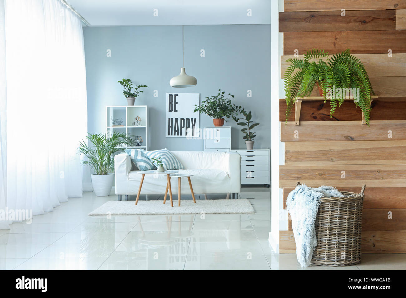 Interior of light beautiful studio apartment Stock Photo - Alamy