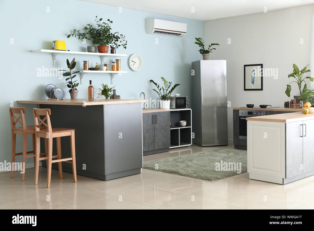 Interior of beautiful modern kitchen Stock Photo - Alamy