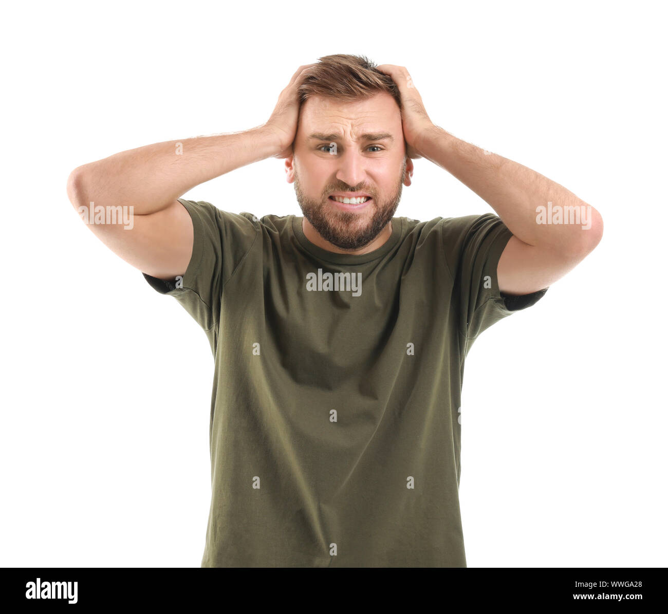 Stressed young man on white background Stock Photo - Alamy