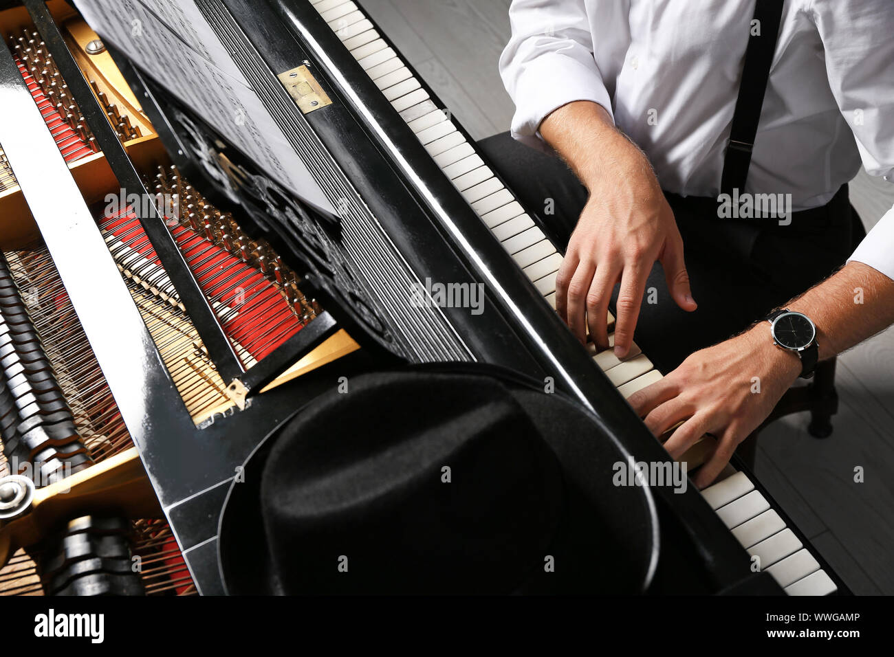 Man playing grand piano at the concert Stock Photo - Alamy