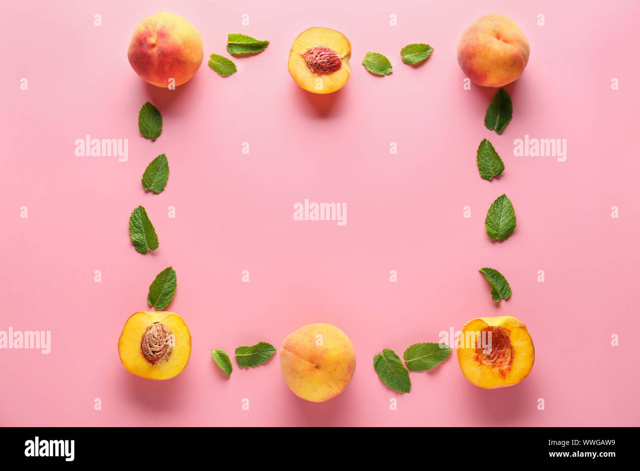 Frame made of ripe peaches on color background Stock Photo - Alamy