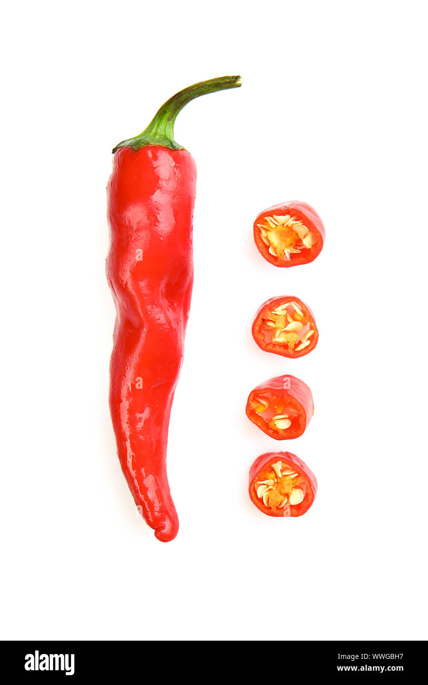Whole and cut red chili peppers on white background Stock Photo - Alamy