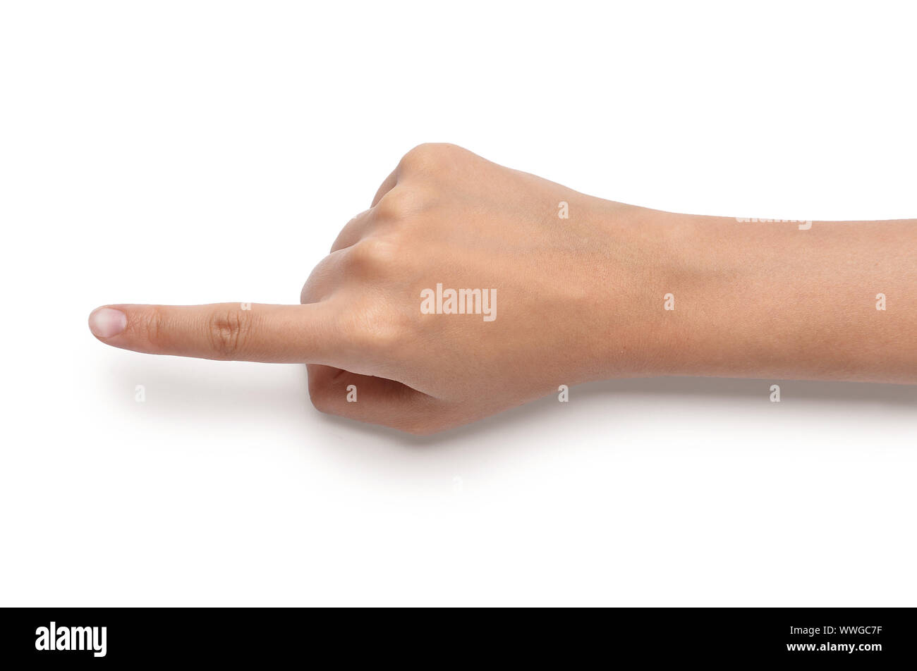 Female hand pointing at something on white background Stock Photo - Alamy