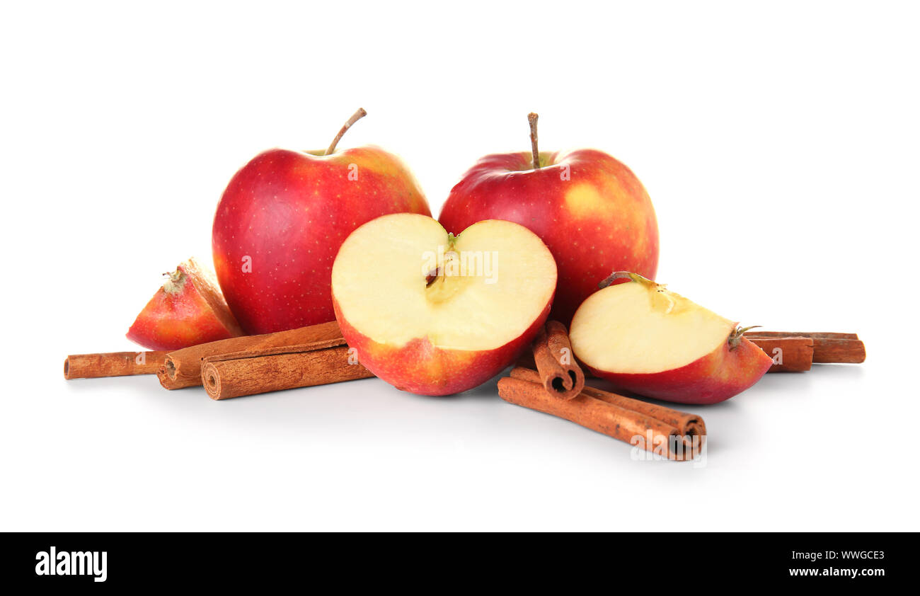 Fresh apple with cinnamon on white background Stock Photo - Alamy