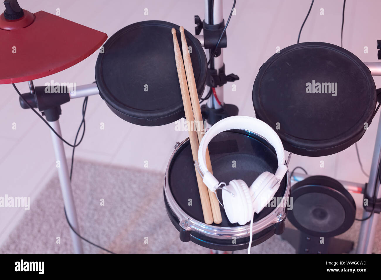 Music, hobby, musical instruments concept - drum with drumsticks and ...