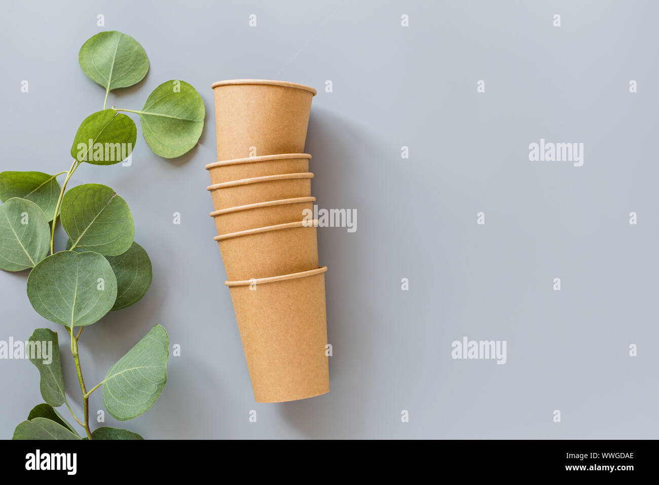 eco natural paper coffee cups flat lay on gray background. sustainable ...