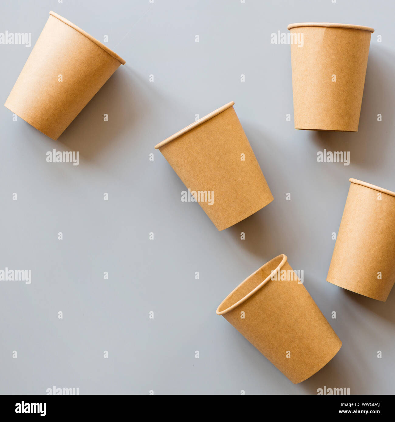 eco natural paper coffee cups flat lay on gray background. sustainable ...