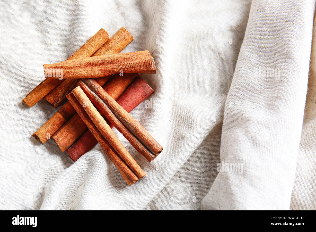 Sticks of aromatic cinnamon on cloth Stock Photo - Alamy