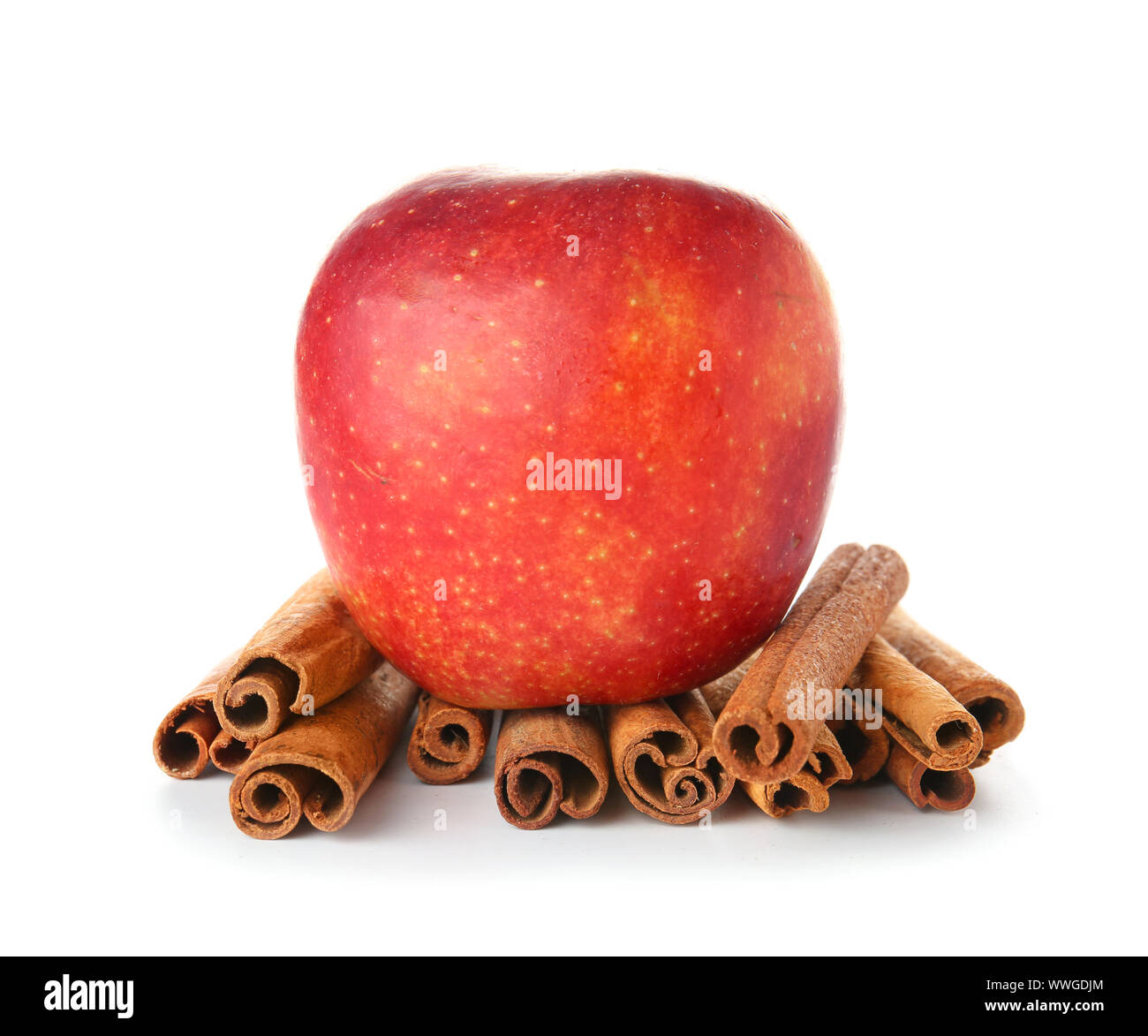 Fresh apple with cinnamon on white background Stock Photo - Alamy