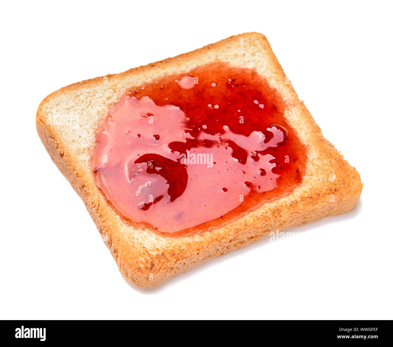 Tasty toasted bread with jam on white background Stock Photo - Alamy