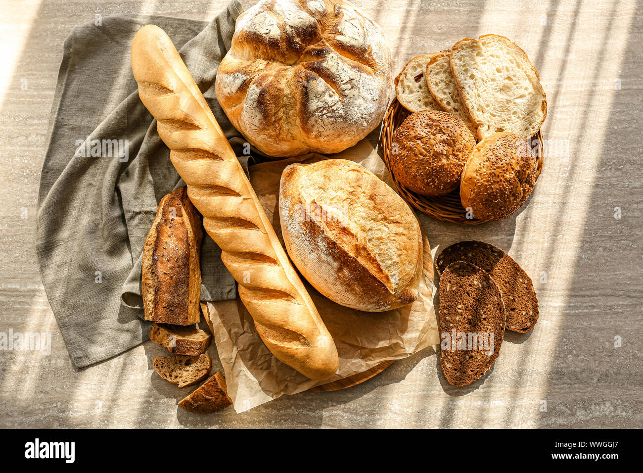 Assortment of fresh bread on table Stock Photo - Alamy