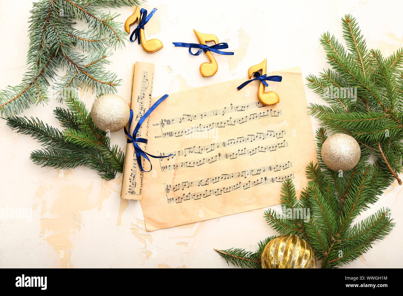 Note sheets and Christmas decor on light background Stock Photo - Alamy