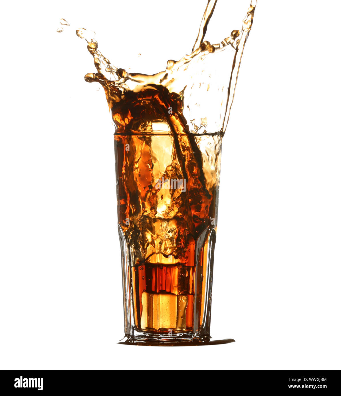 Glass of cold cola with splash on white background Stock Photo - Alamy