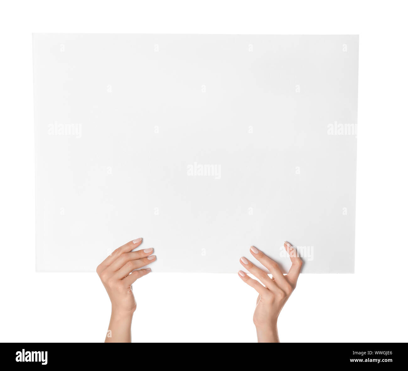 Female hands with blank poster on white background Stock Photo - Alamy