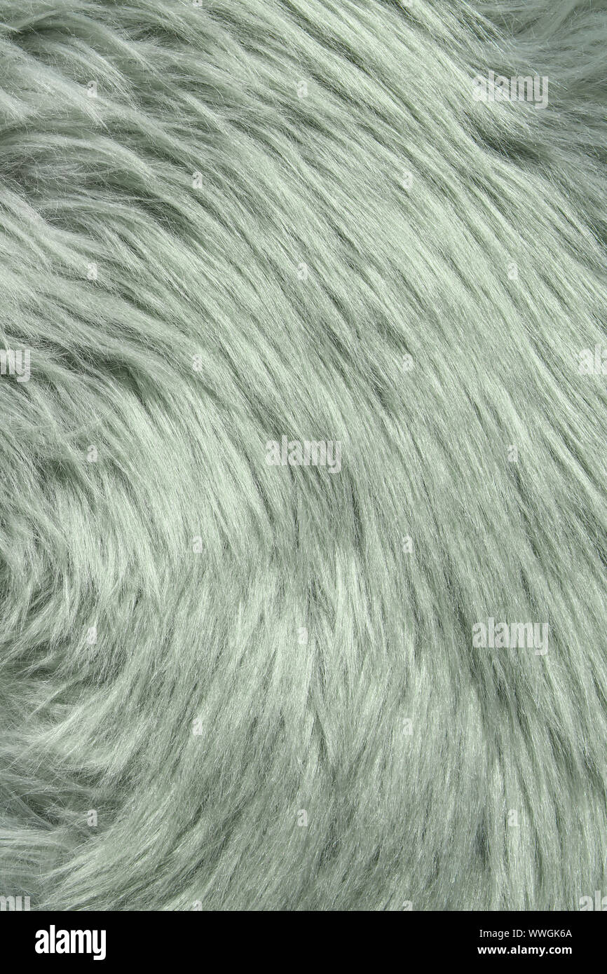 Grey furry material as background Stock Photo - Alamy