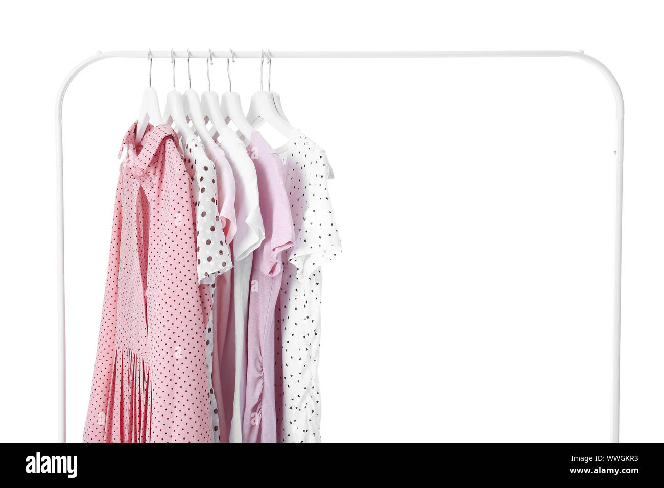 Rack with hanging clothes on white background Stock Photo - Alamy