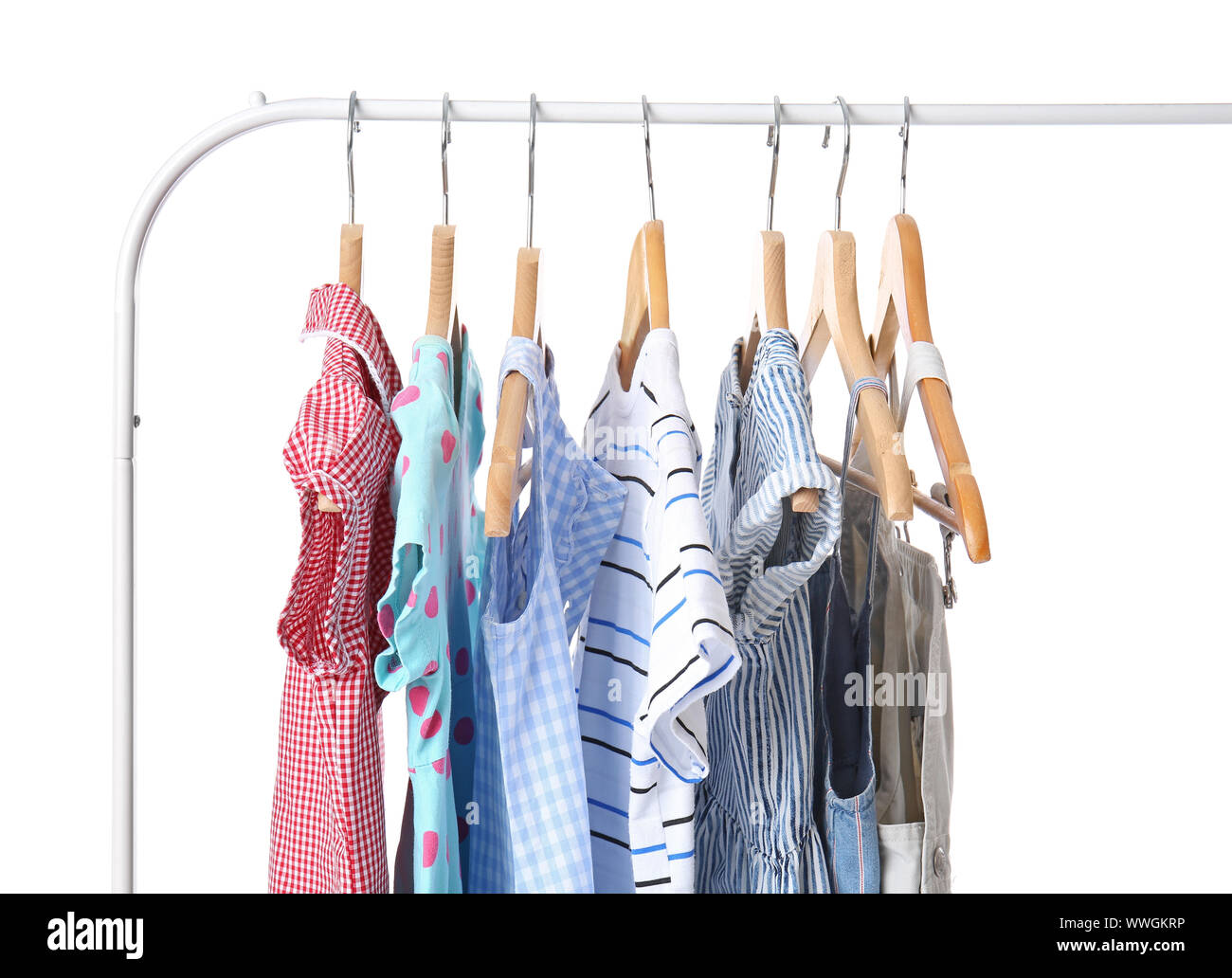 Rack with hanging clothes on white background Stock Photo - Alamy