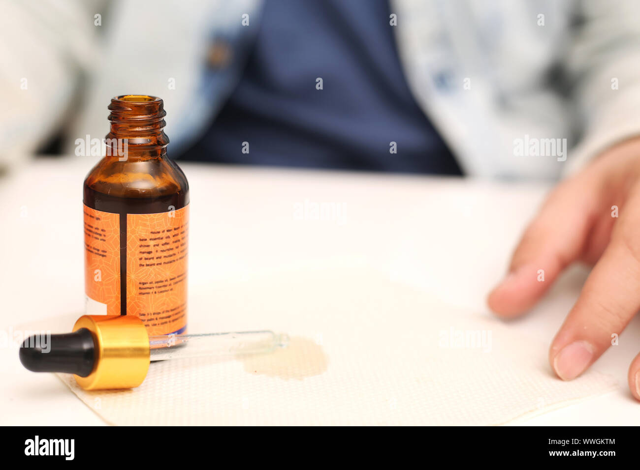 Picture of man drops medicine bottle holding in hand. Isolated on white ...