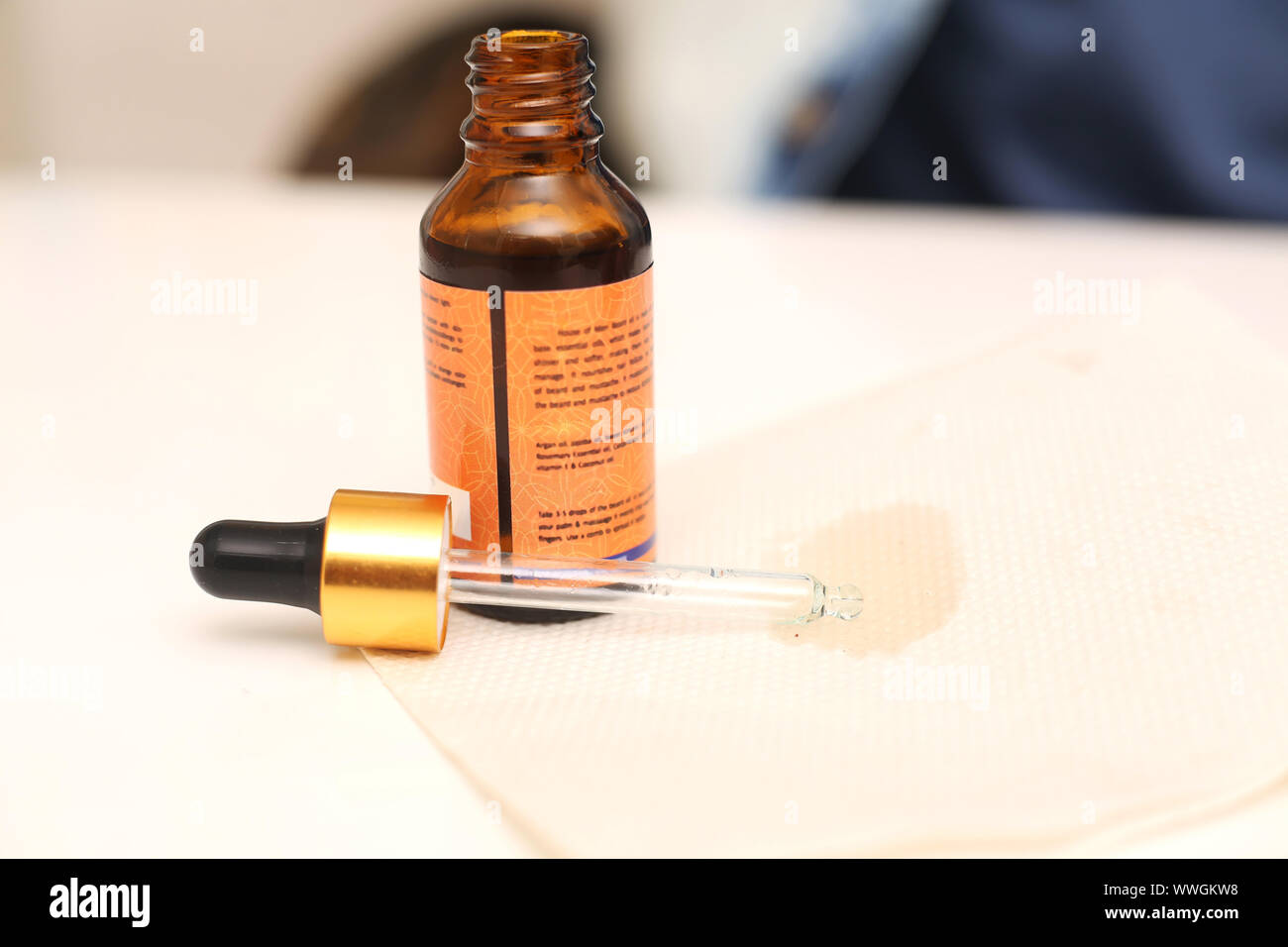 Picture of man drops medicine bottle holding in hand. Isolated on white ...