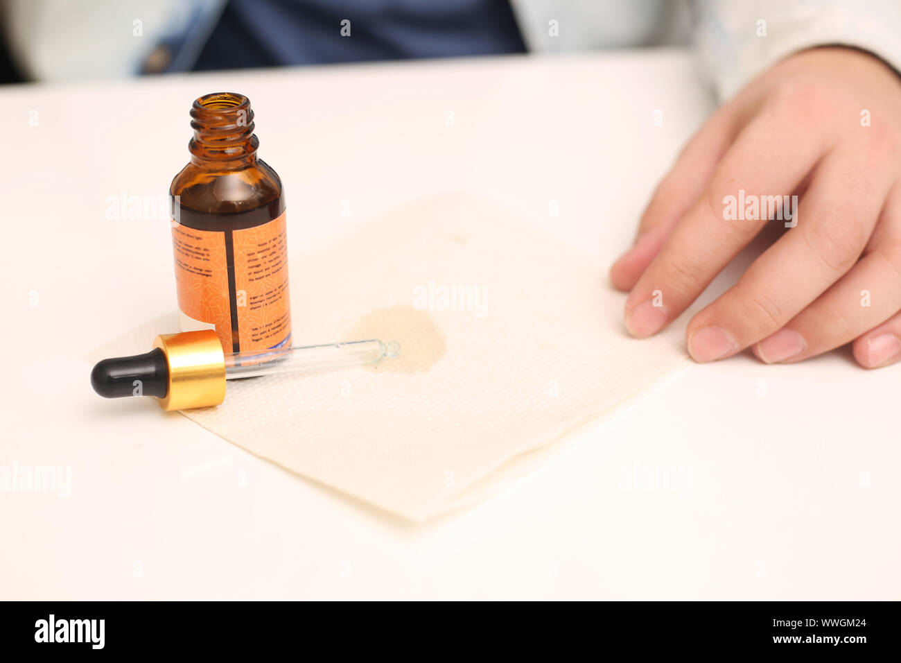 Picture of man drops medicine bottle holding in hand. Isolated on white ...