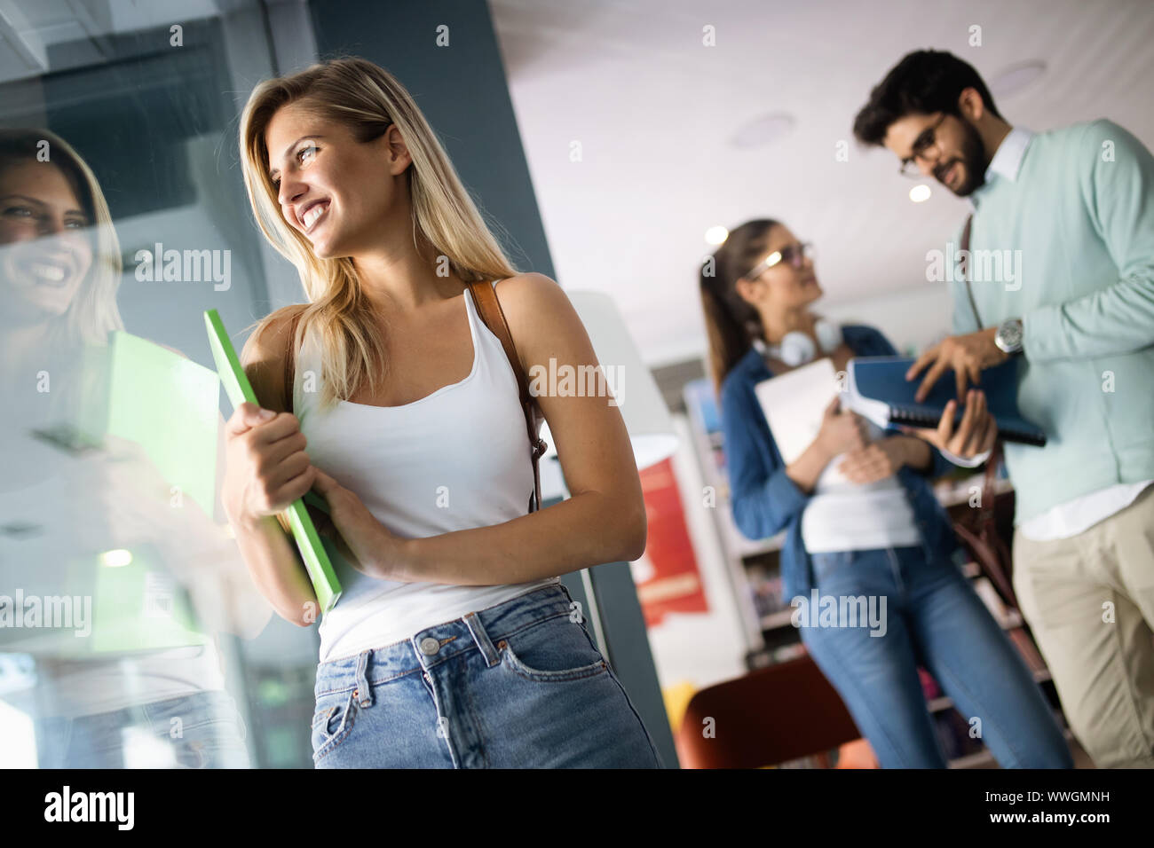 Happy group of students studying and learning together in college Stock ...