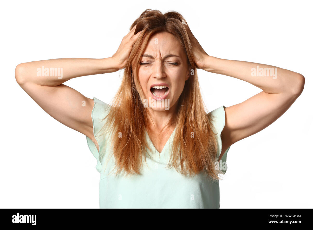 Stressed woman on white background Stock Photo - Alamy