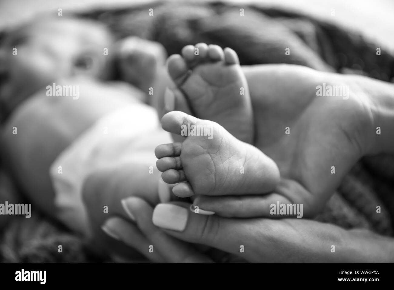 Cute baby legs Black and White Stock Photos & Images - Alamy