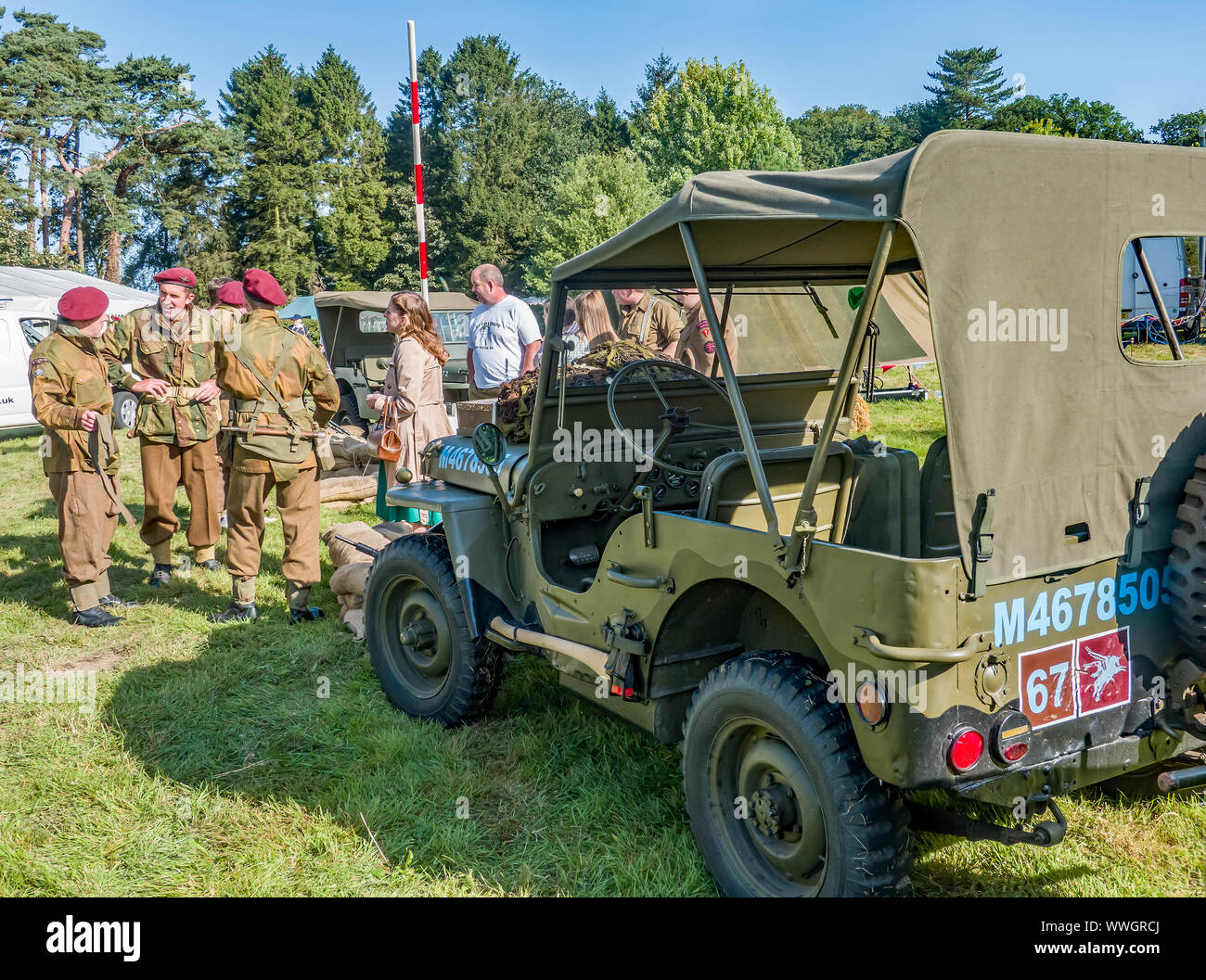 Group of young soldiers dressed up in 1940s style military uniforms ...