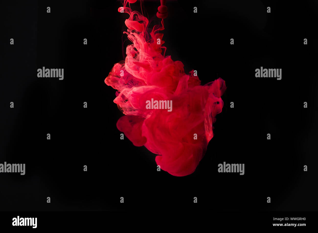 Red Ink In Water On Black